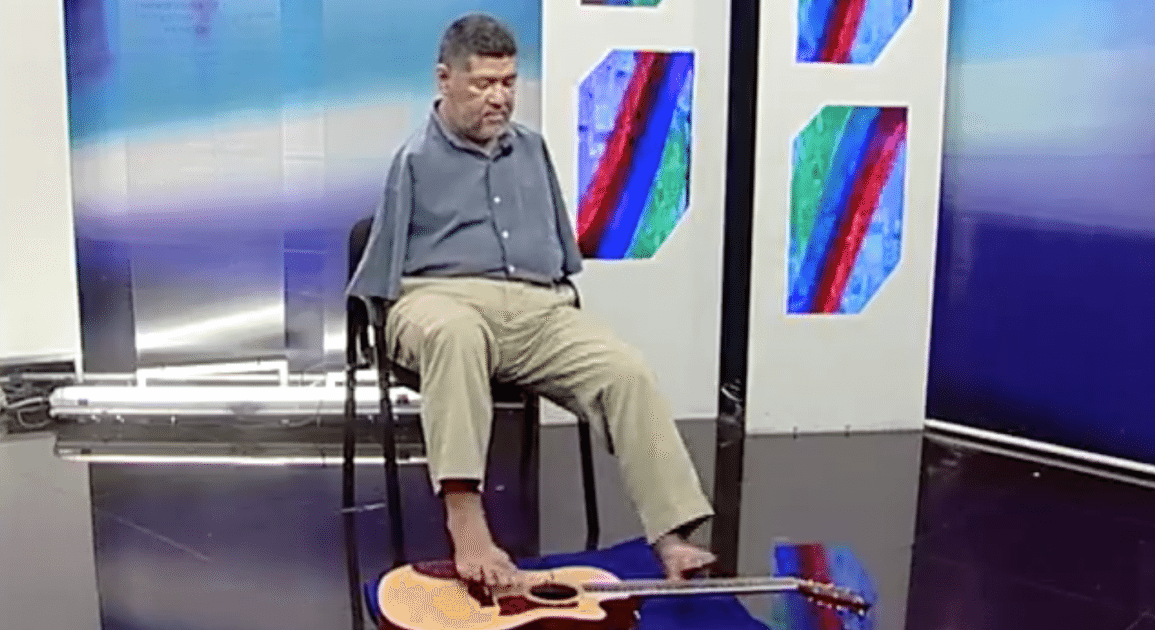 Watch A Man With No Arms Play 'Let It Be' On Guitar Using Only His Feet